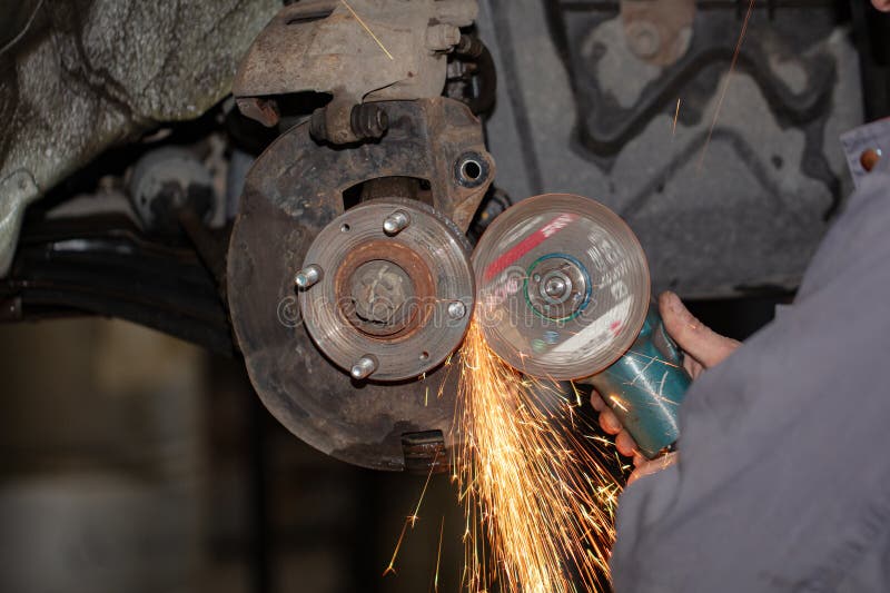 Automobile Wheel Repair Using Angle Grinder Stock Photo - Image of ...
