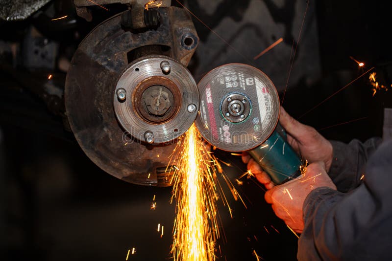 Automobile Wheel Repair Using Angle Grinder Stock Photo - Image of ...