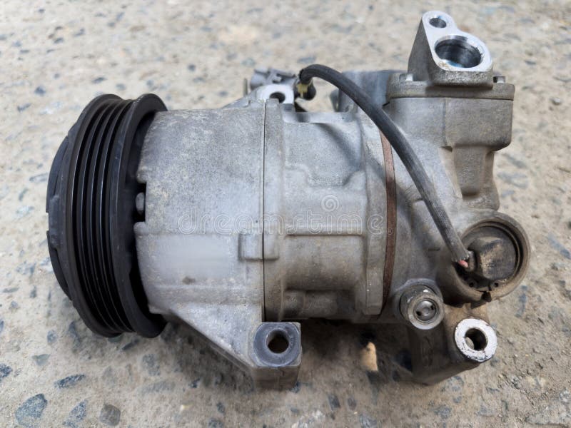 Automotive Air Conditioning Compressor on Ground Closeup View Stock ...