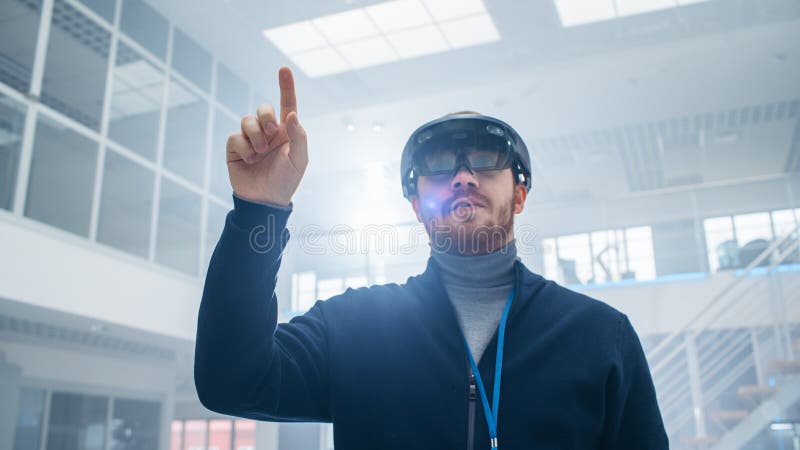 Automotive Engineer Using Augmented Reality Headset and Moving Virtual ...