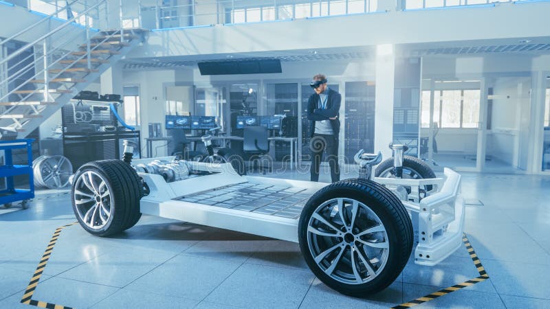 Automotive Engineer Working on Electric Car Chassis Platform, Using ...