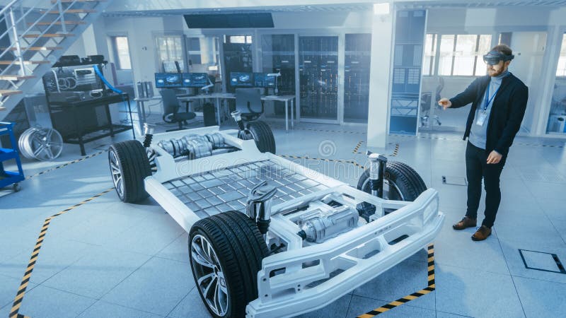 Automotive Engineer Working on Electric Car Chassis Platform, Using ...