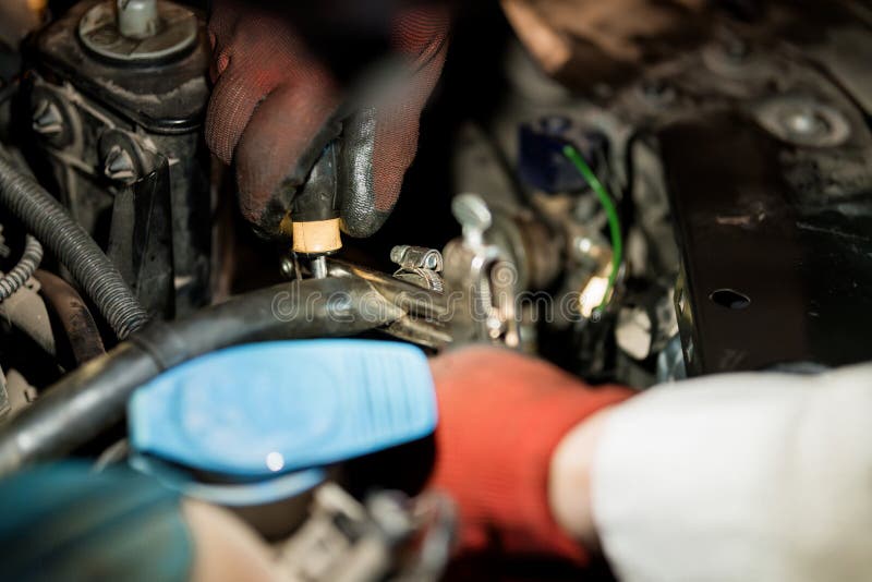 Automotive Repair: Mechanics Working on Engine Components Stock Image ...