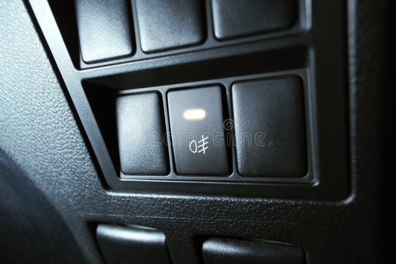 Automotive Spotlight Button Switch on Dashboard in the Car Stock Photo ...