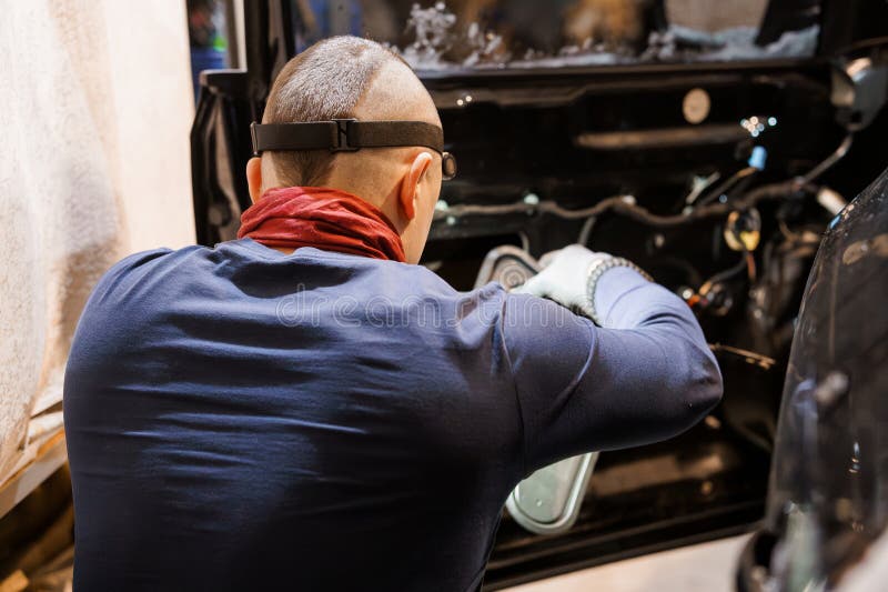 Automotive Technician Working on Car Interior Stock Photo - Image of ...