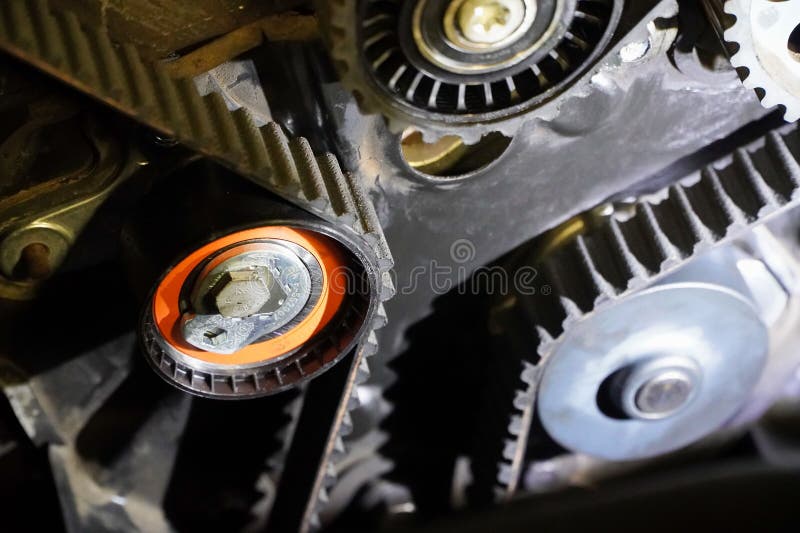 Automotive Timing Belt,New Timing Belt with New Rollers Installed on ...