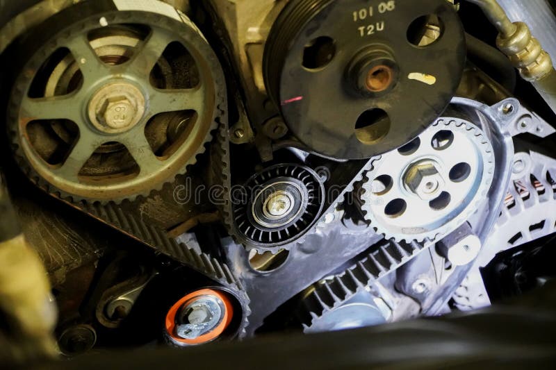 Automotive Timing Belt,New Timing Belt with New Rollers Installed on ...