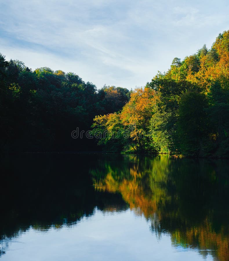 Autumn Colors on the Trees by the Lake, Deep Shadows Stock Image ...
