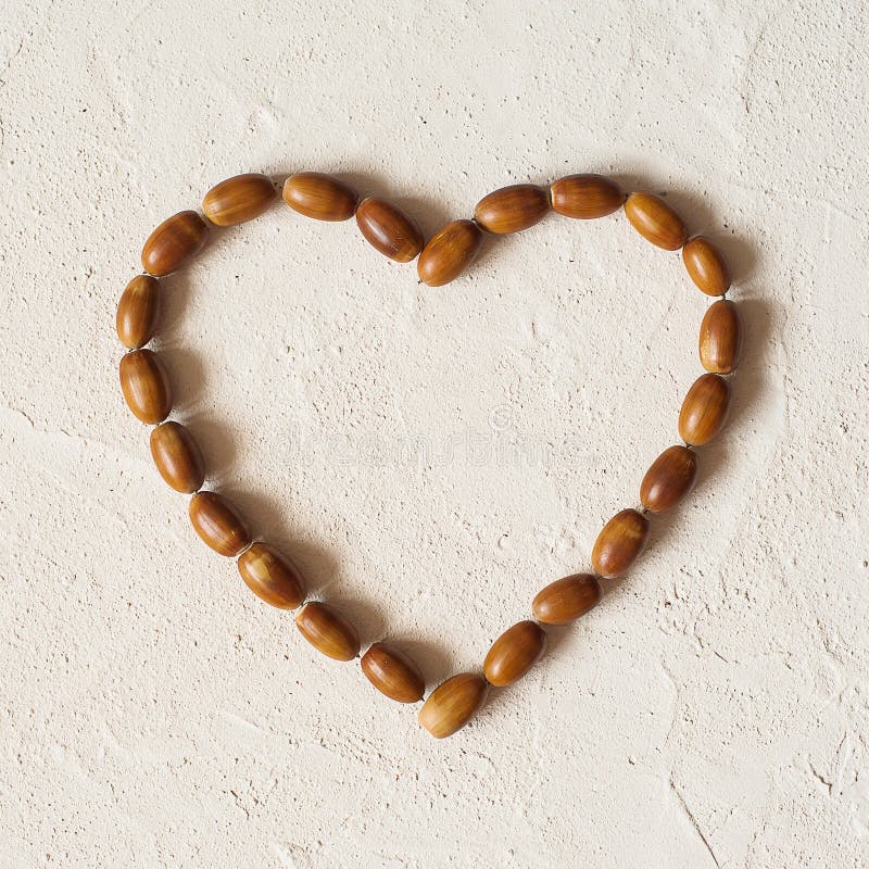Autumn Composition. Frame Made of Acorn in the Shape of Heart on White ...