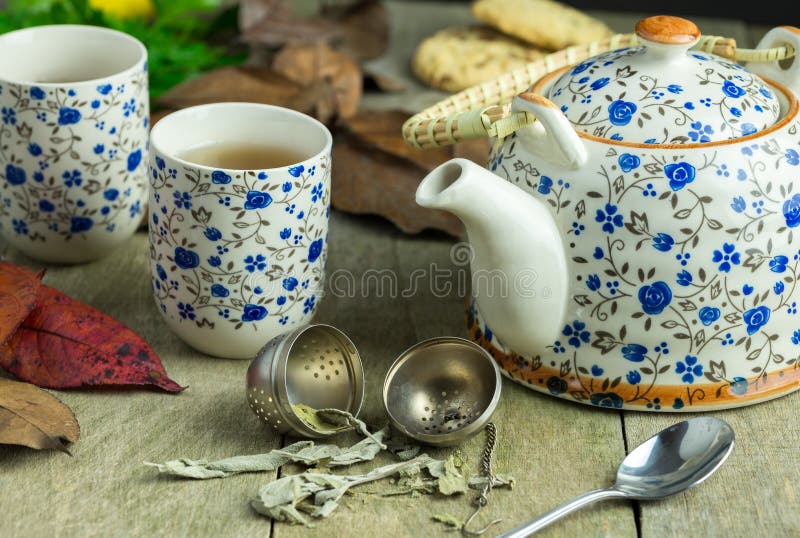 Autumn Cup of Tea with Teapot on a Rustic Table. Stock Image - Image of ...