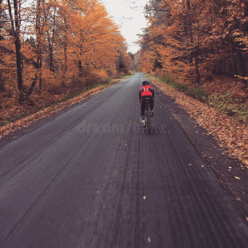 Autumn cycling ride stock image. Image of suit, cycling - 79669079