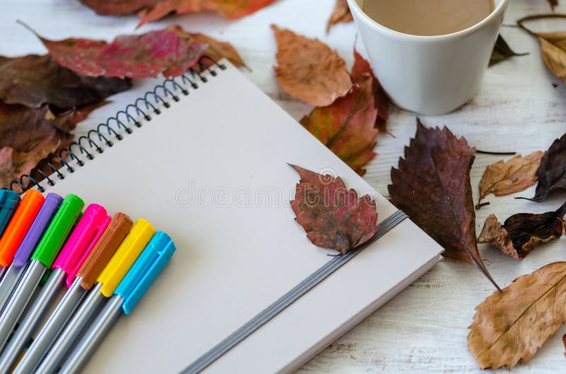 Autumn, Fall Concept.Study is between Autumn Leaves. Stock Image ...