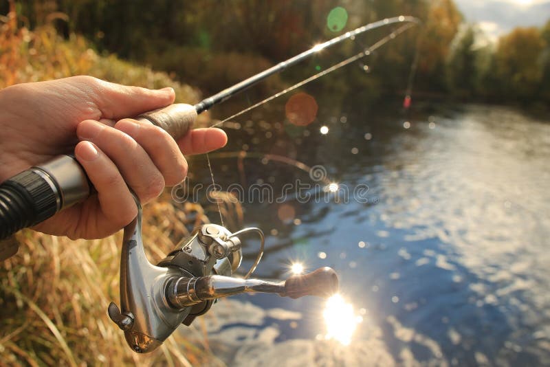 Autumn fishing spinning stock photo. Image of person - 66120336