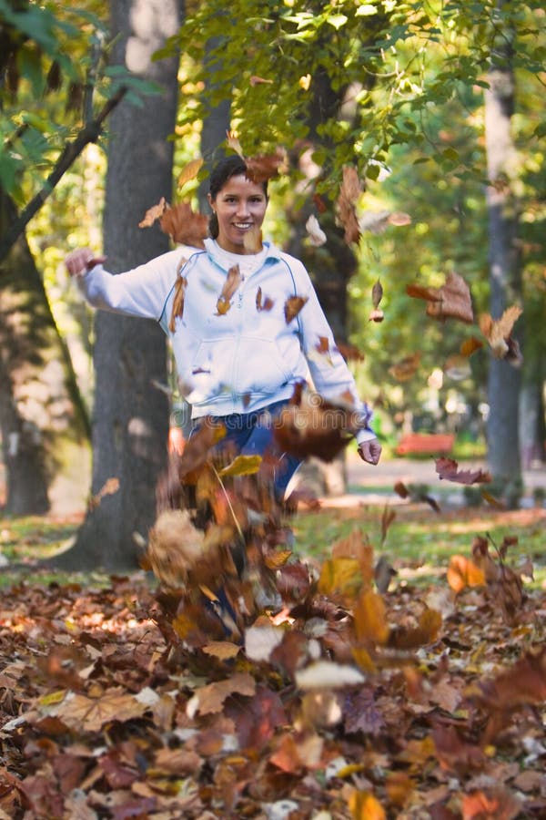 Autumn fun stock photo. Image of enjoy, kicking, active - 3386024