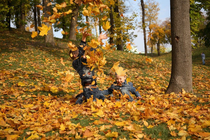 Autumn games stock photo. Image of park, brothers, leaves - 7326194