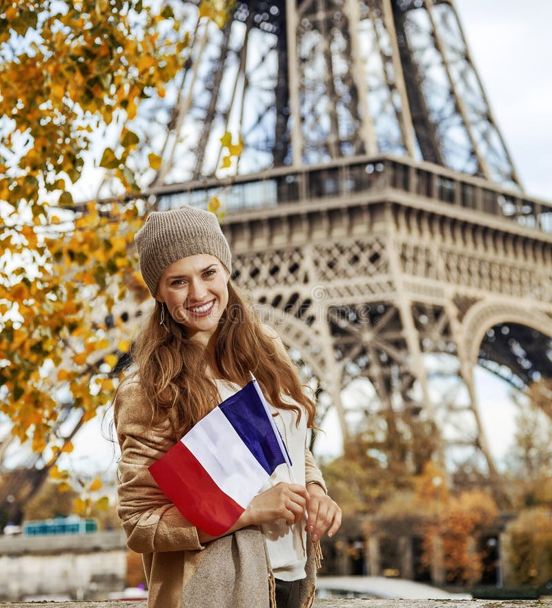 Smiling Elegant Woman on Embankment in Paris, France with Flag Stock ... Smiling Elegant Woman on Embankment in Paris, France with Flag Stock ...