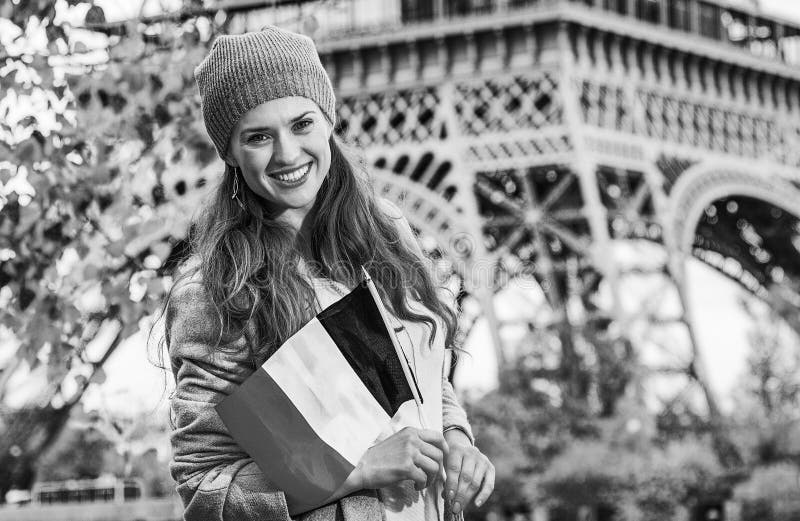 Smiling Elegant Woman on Embankment in Paris, France with Flag Stock ... Smiling Elegant Woman on Embankment in Paris, France with Flag Stock ...