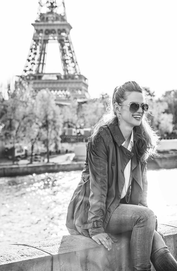 Smiling Elegant Woman Sitting on the Parapet in Paris, France Stock ... Smiling Elegant Woman Sitting on the Parapet in Paris, France Stock ...