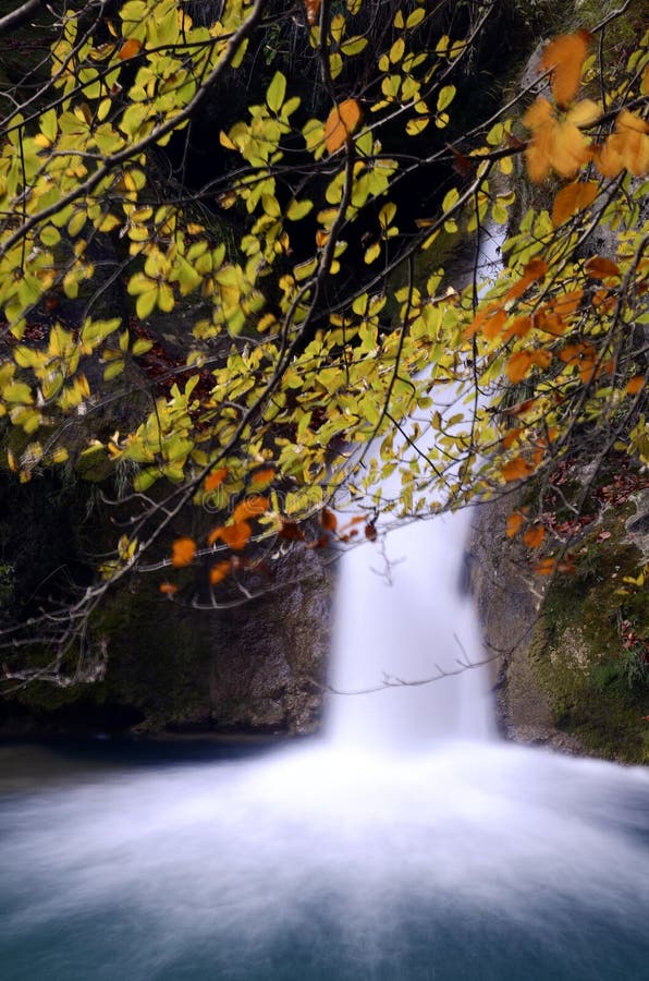 Autumn Image of a Waterfall in the Urederra River Natural Reserve ...
