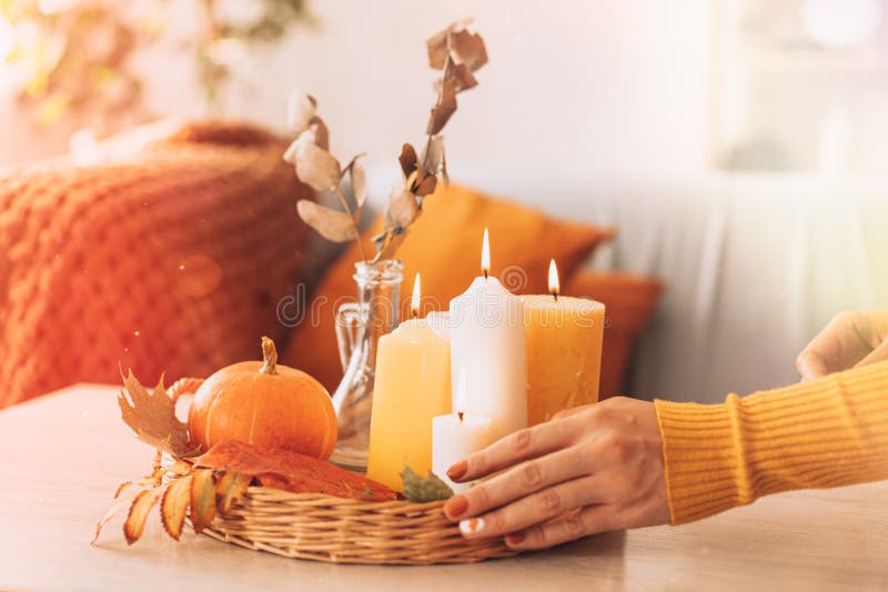 Autumn Interior and Festive Mood with Burning Candles and Pumpkin Stock ...