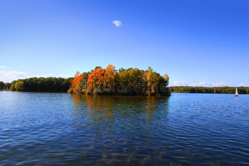 Autumn island in lake stock image. Image of panoramic - 34021613