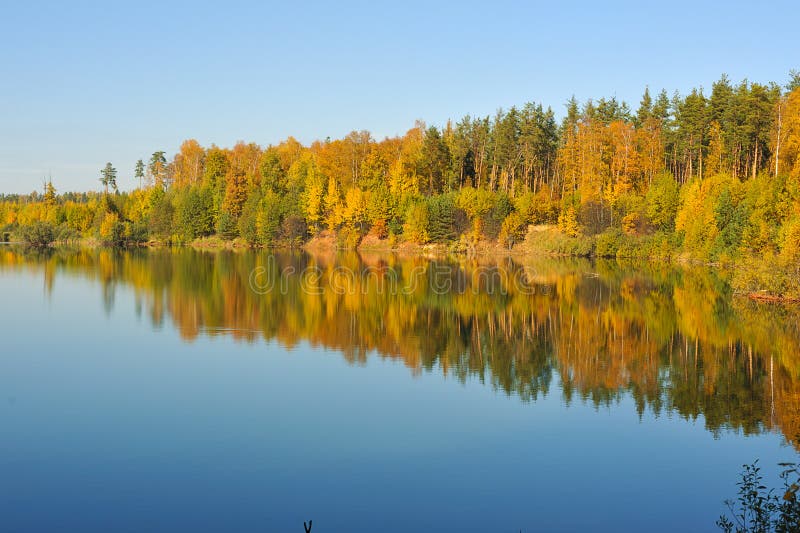 Autumn Trees Reflected in Blue Lake in Fall Stock Image - Image of ...