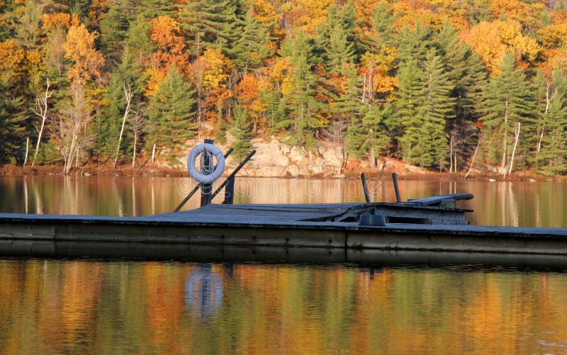 Autumn Lake Reflection with a Canoe Stock Image - Image of green, fall ...