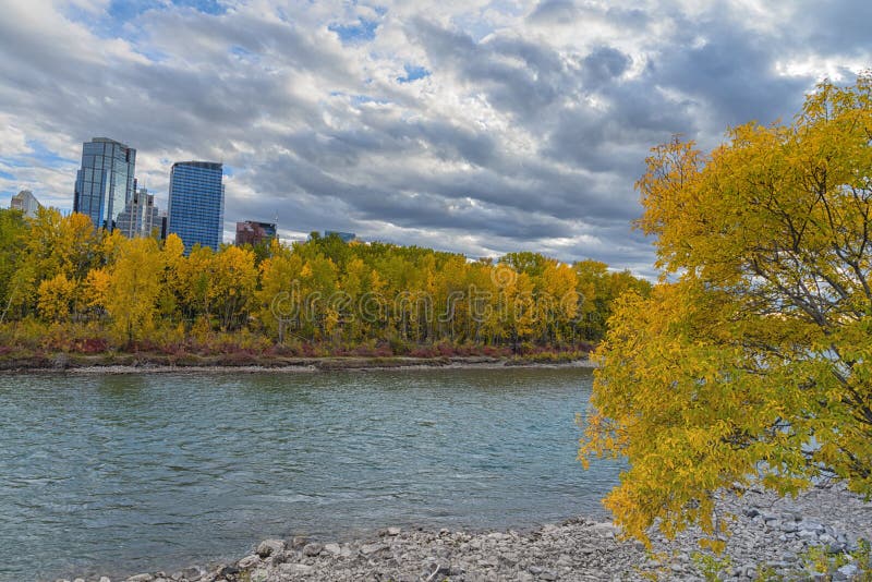 Autumn Landscape of the Bow River in Downtown Calgary with Highrises in ...