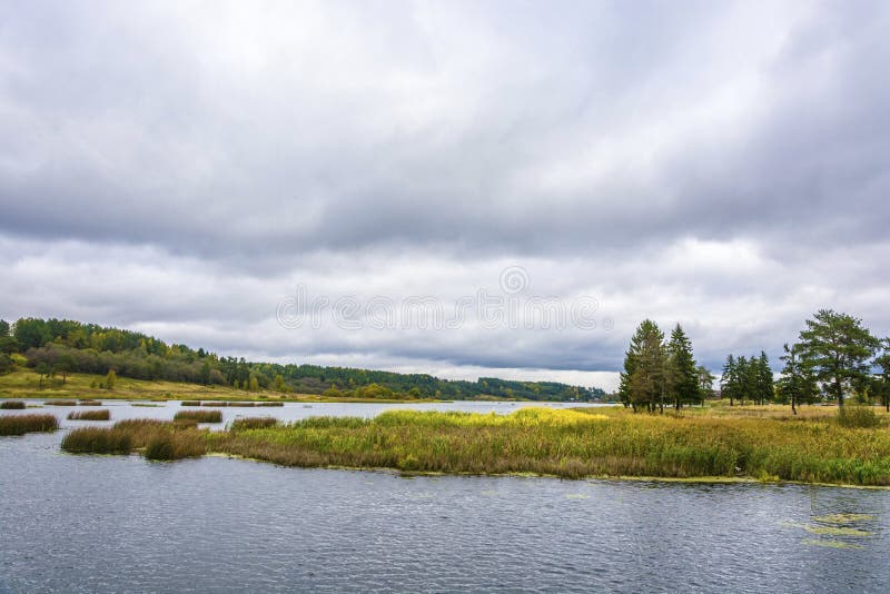 Autumn Landscape with a River and a Cloudy Sky on an Overcast Da Stock ...