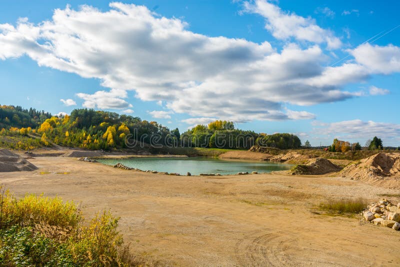 Autumn Landscape. Sand Pit. Lake and Yellow Trees. Stock Image - Image ...