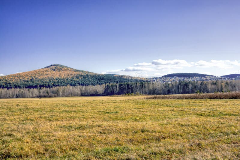 Autumn Landscape Sloping Meadow on a Background of Forest and Mountains ...