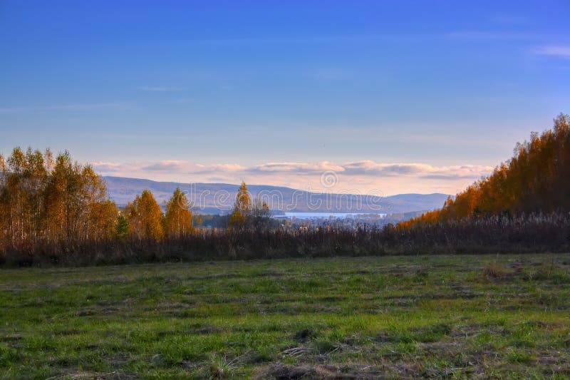 Autumn Landscape Sloping Meadow on a Background of Forest and Mountains ...