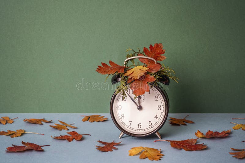 Autumn Leaves and Alarm Clock Stock Photo - Image of retro, clock ...