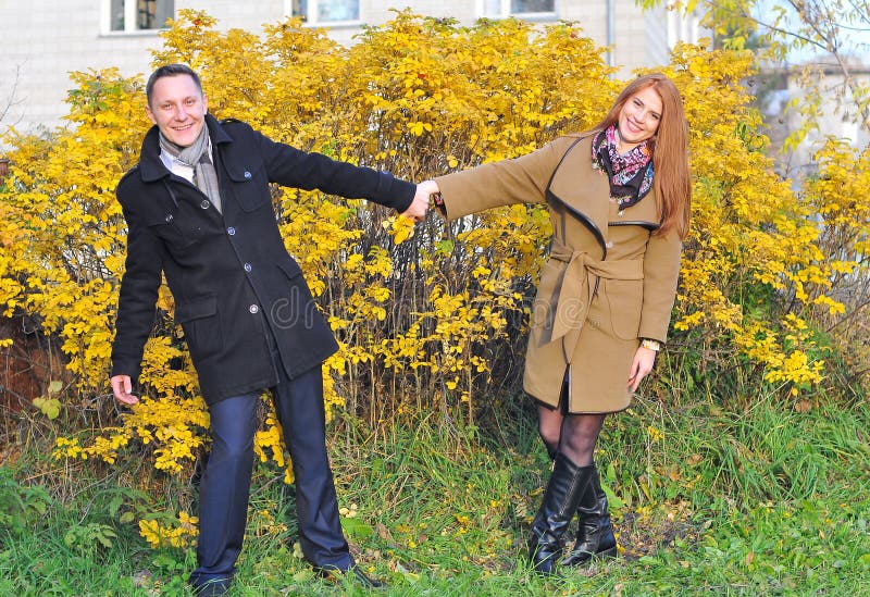 Autumn Leaves in Hands Couple Hug Stock Photo - Image of dating, style ...