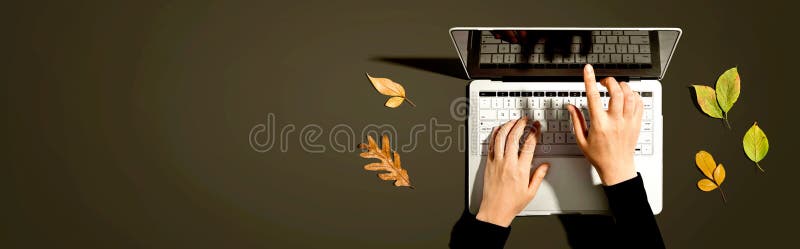Autumn Leaves with Person Using a Laptop Computer Stock Image - Image ...