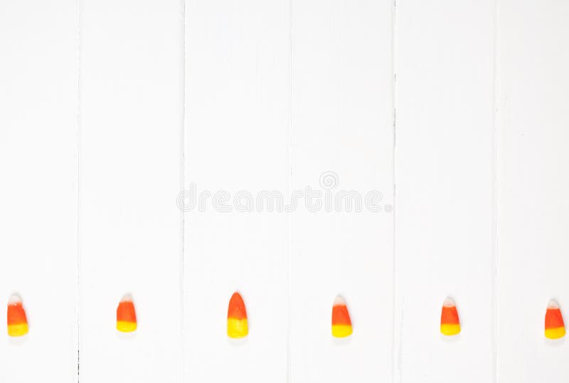 Autumn: Line of Candy Corn Border Background Stock Image - Image of ...