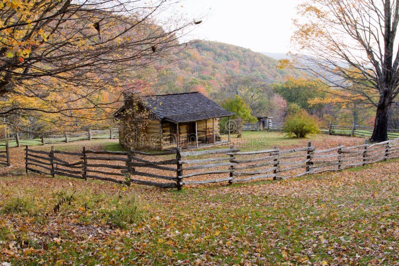 Autumn Log Cabin With Rail Fence Stock Photo - Image: 10119888