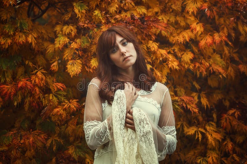 Autumn maiden portrait stock photo. Image of orange - 258049224