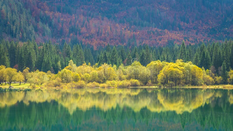 Autumn morning in the alps stock photo. Image of meadow - 71447536