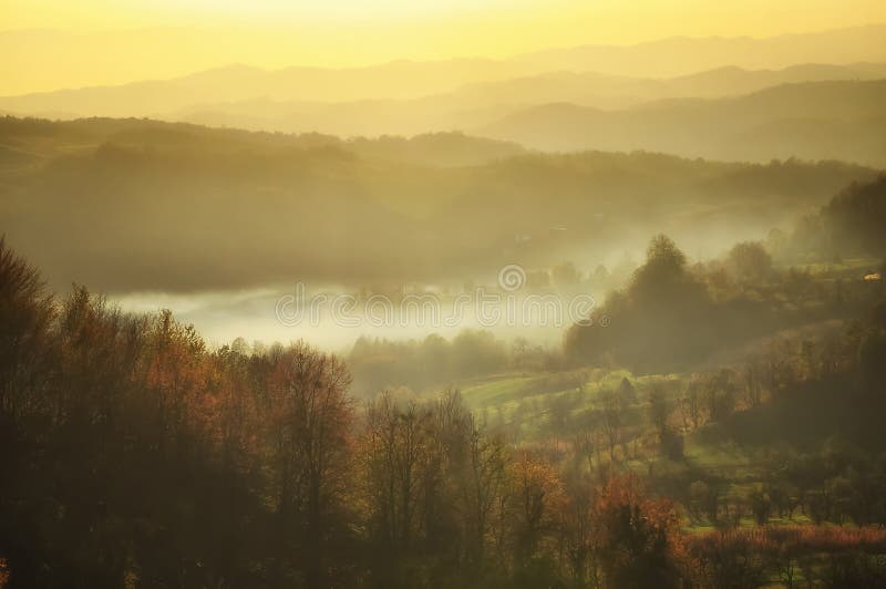 Autumn Mountain in the Sunset Mist. Lens Flare Effect. Stock Photo ...