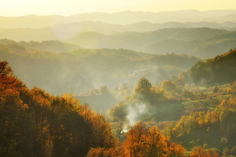 Autumn Mountain in the Sunset Mist. Lens Flare Effect. Stock Image ...