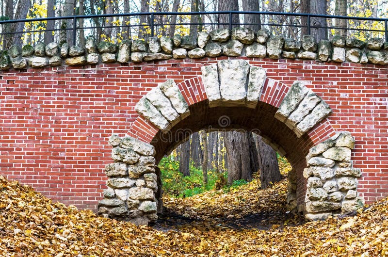 Autumn. Old Brick Arch Overlooking the Autumn Park Stock Image - Image ...