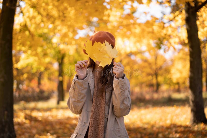 Autumn Outdoor Portrait of Beautiful Happy Teen Girl Walking in Park or ... Autumn Outdoor Portrait of Beautiful Happy Teen Girl Walking in Park or ...