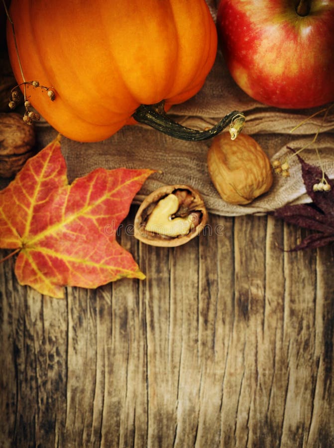 Autumn Pumpkins and Apples with Fall Leaves on Wooden Background Stock ...