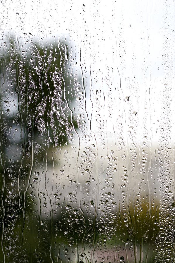 Raindrops on Glass Window with Building View Stock Photo - Image of ...