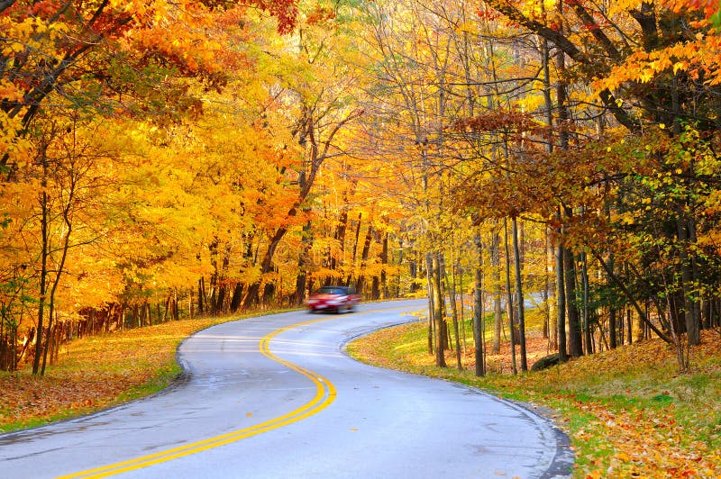Autumn road with car stock photo. Image of nature, speed - 12629294
