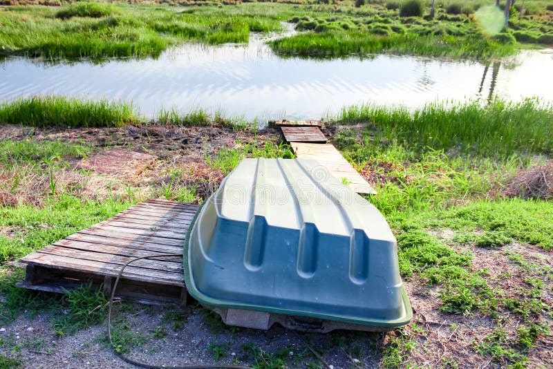 Autumn Row Boats on the Riverbank Stock Photo - Image of bayou ...