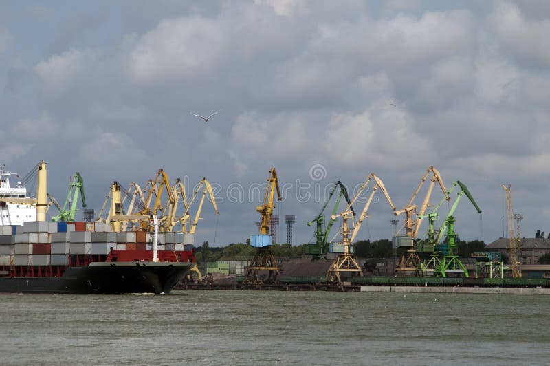 View of Working Harbor with Loading Docks and Cargo Vessel Stock Image ...