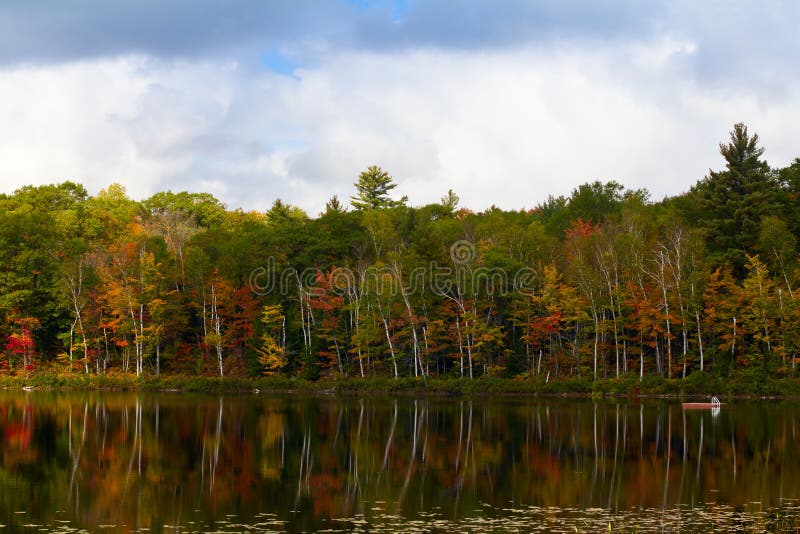 Fall scene on a small lake stock photo. Image of colors - 30278522