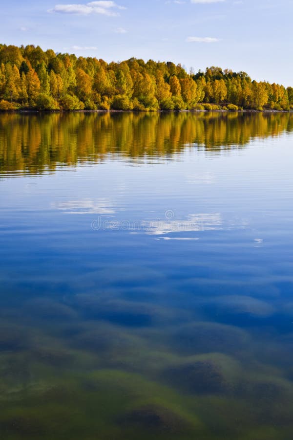 Autumn Shoreline with Beautiful Clouds Stock Image - Image of ...